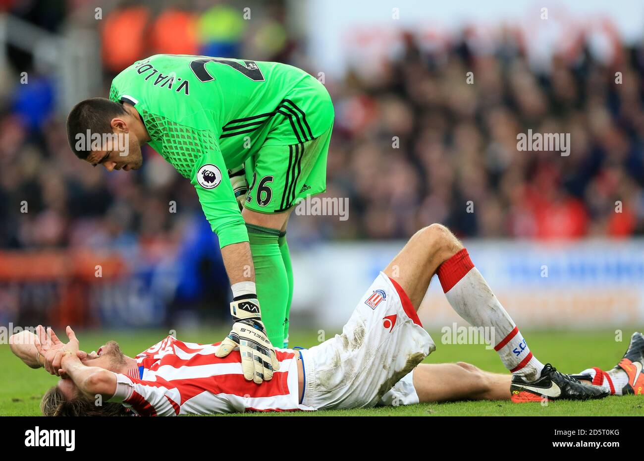 Stoke City's Peter Crouch on the ground after picking up an injury ...