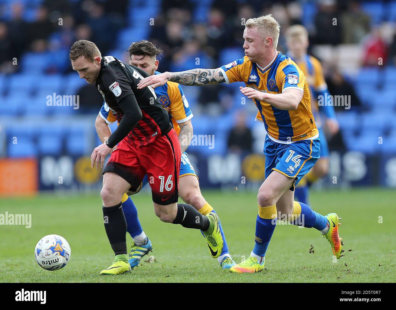 Shrewsbury Town's Jack Grimmer and Coventry City's Stuart Beavon battle ...