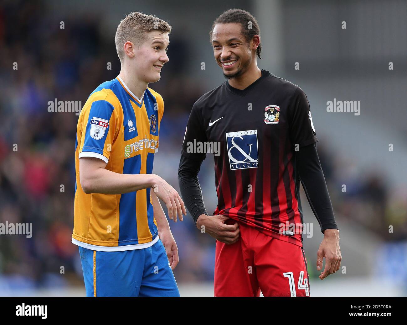 Shrewsbury Town's Ryan Yates and Coventry City's Kwame Thomas share a ...