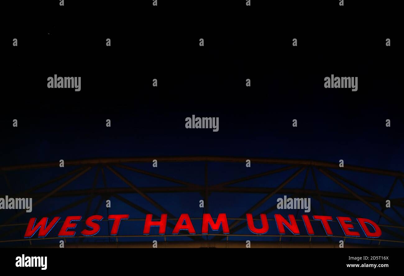 General view of West Ham United signage lit up at the London Stadium ...