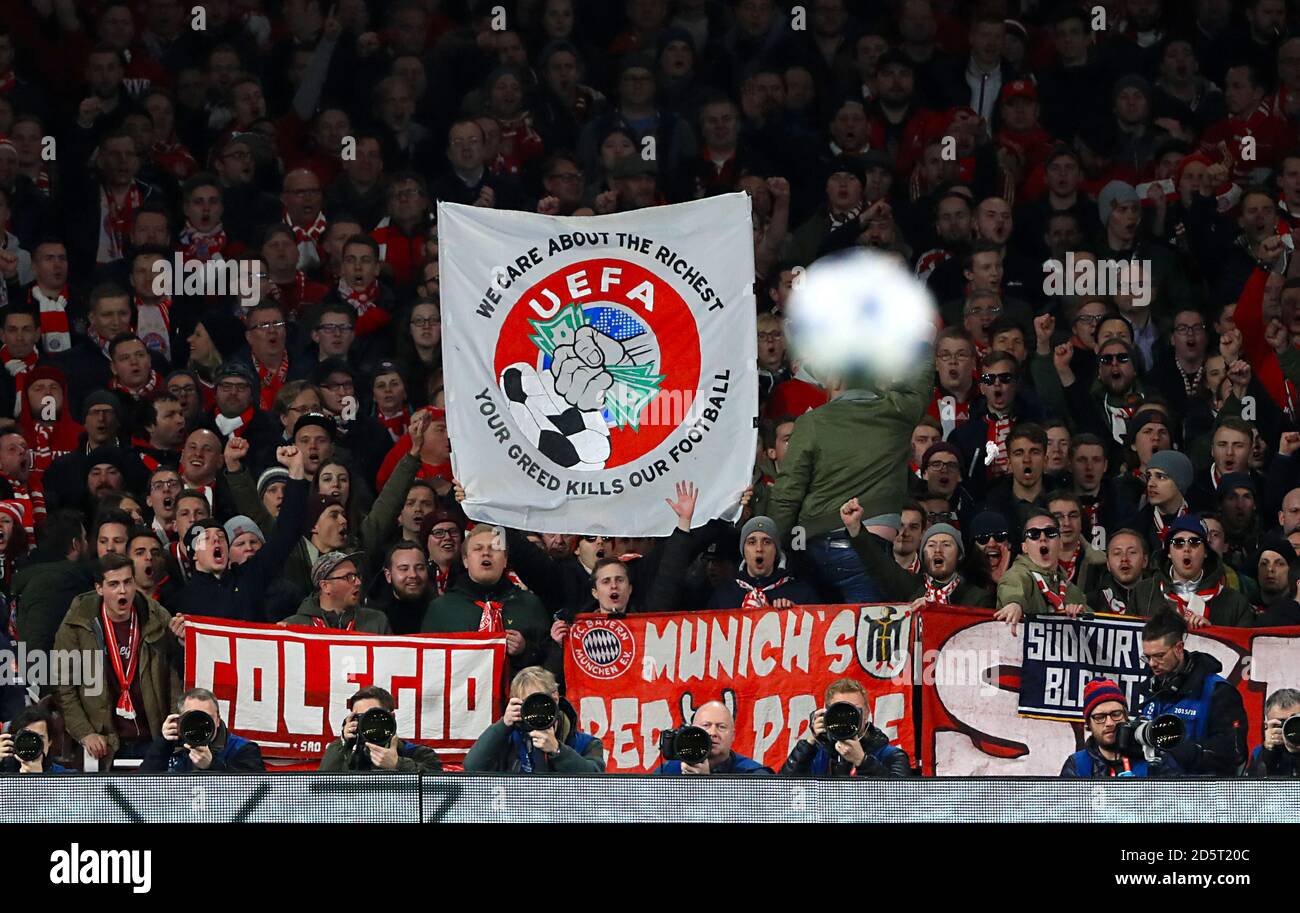 Fans hold banners in the stands Stock Photo - Alamy