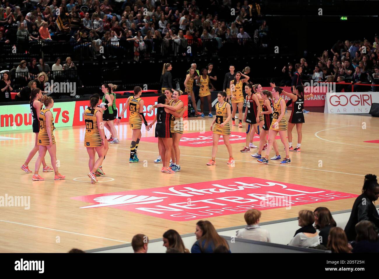 Team Northumbria and Wasps Netball players embrace at the final whistle ...