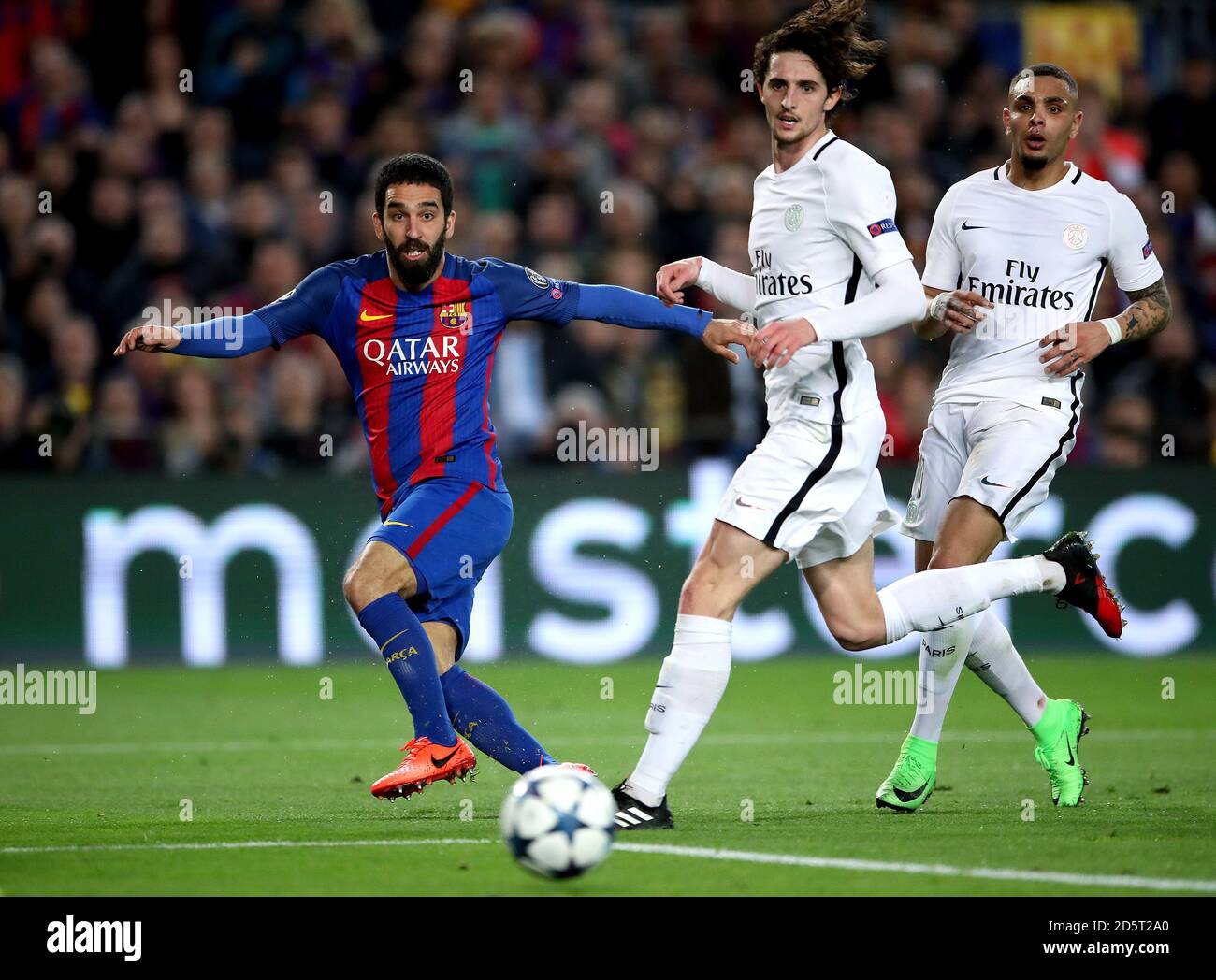 Barcelona's Arda Turan (left) in action Stock Photo - Alamy