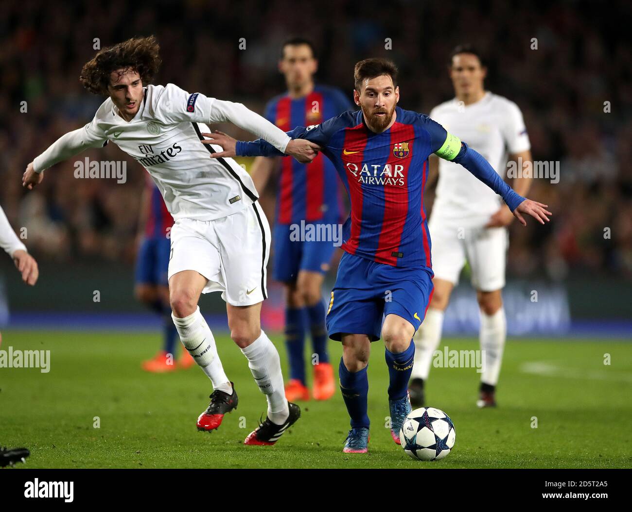Barcelona's Lionel Messi (right) and Paris Saint-Germain's Adrien ...
