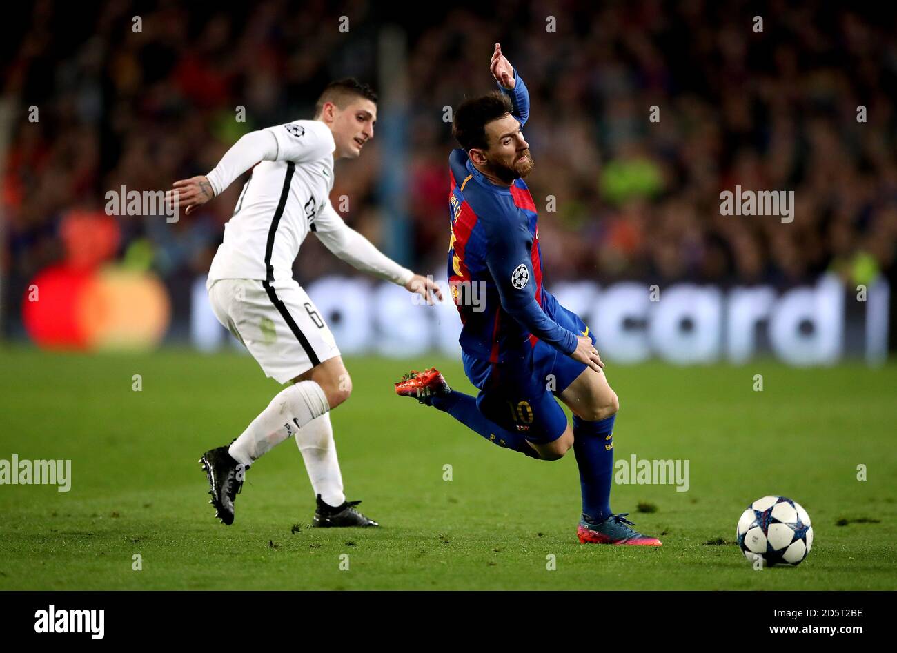 Paris Saint-Germain's Marco Verratti (left) and Barcelona's Lionel ...