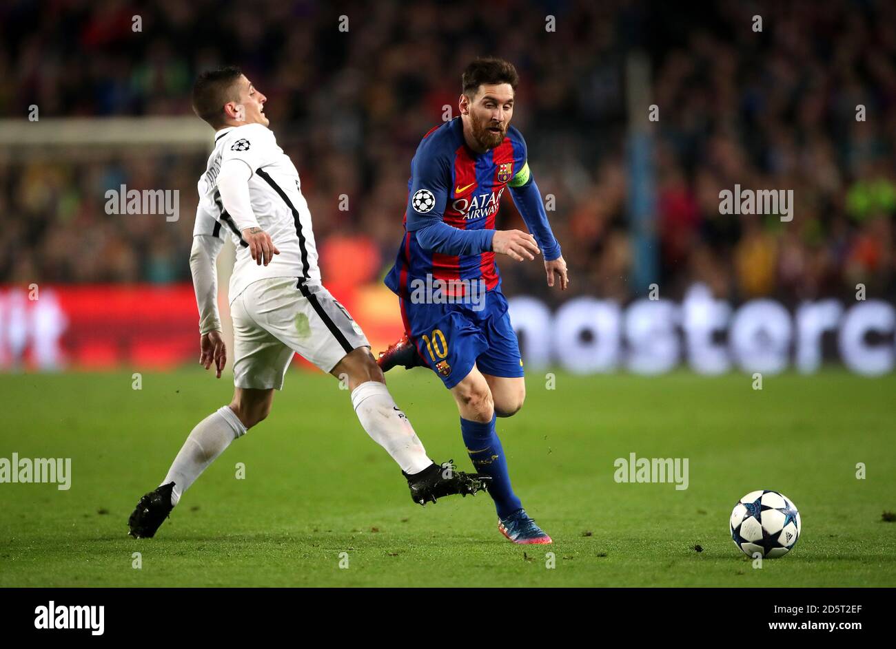 Barcelona's Lionel Messi (right) and Paris Saint-Germain's Marco ...