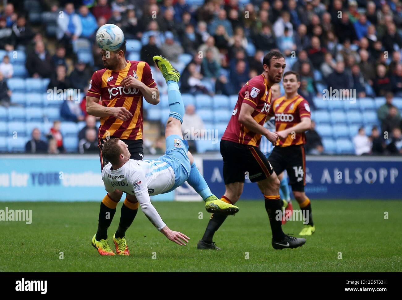 Coventry City's Stuart Beavon (centre) attempts an overhead kick Stock ...