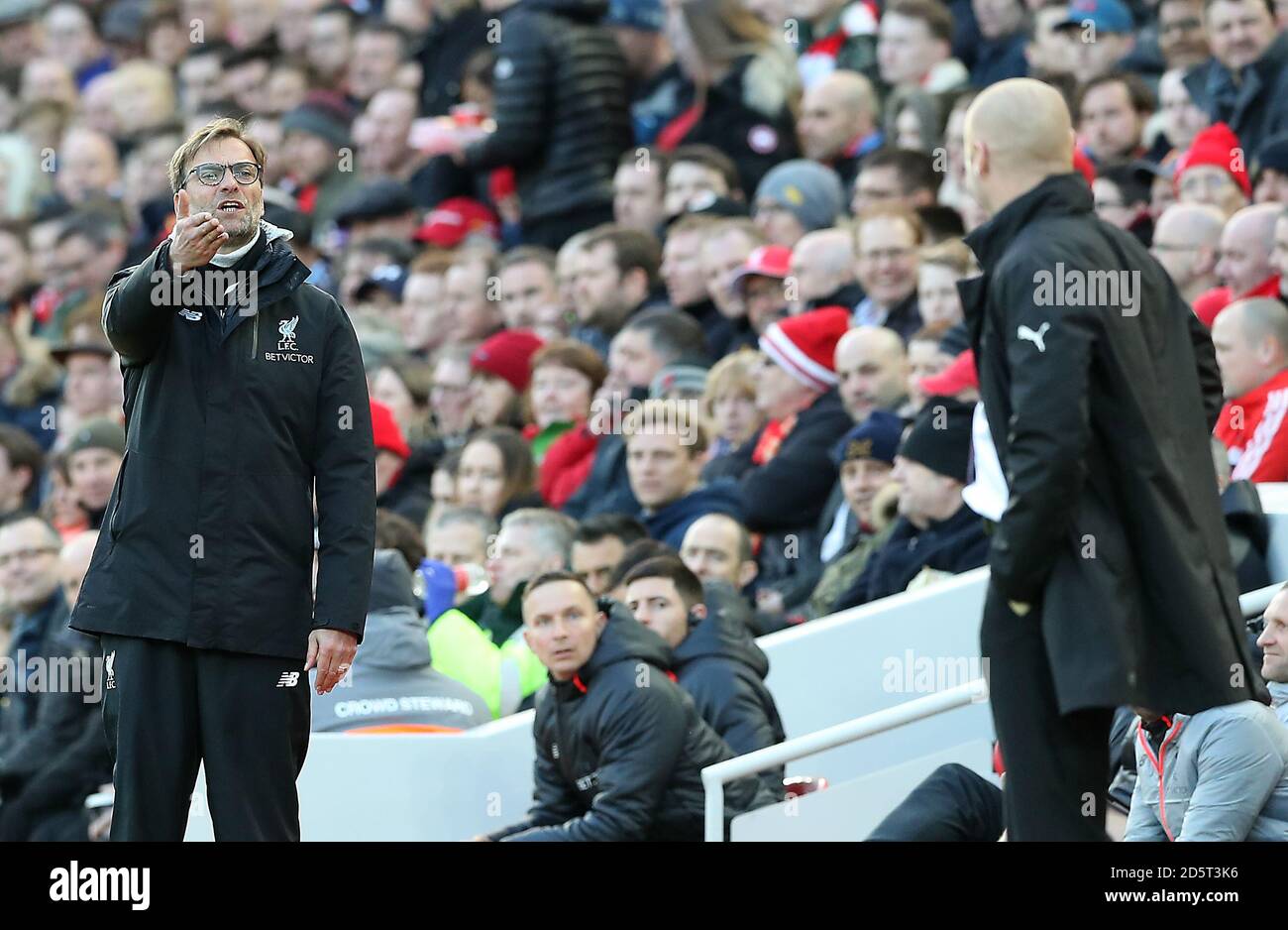 Liverpool manager Jurgen Klopp (left) and Burnley manager Sean Dyche ...