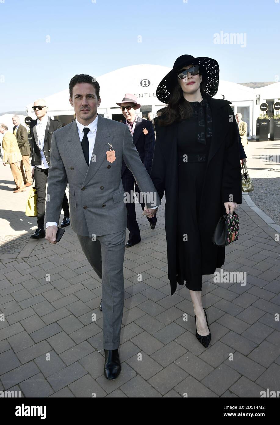 Dave Gardner and Liv Tyler arrive at Cheltenham Racecourse on Ladies ...