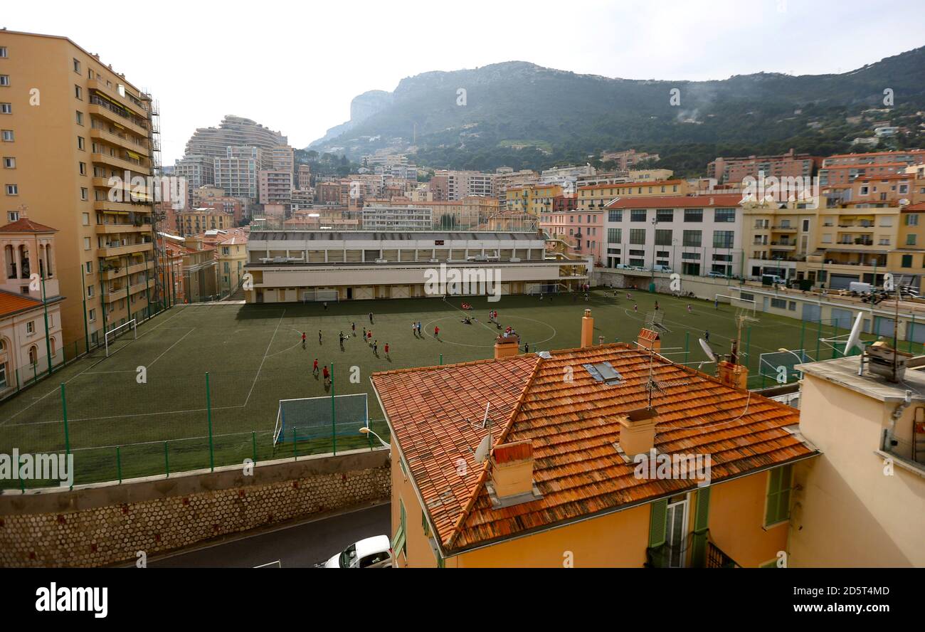 General view of local children playing football on astroturf pitch in ...
