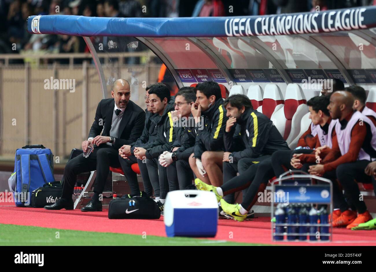 Manchester City manager Pep Guardiola (left) with coaching staff on the ...