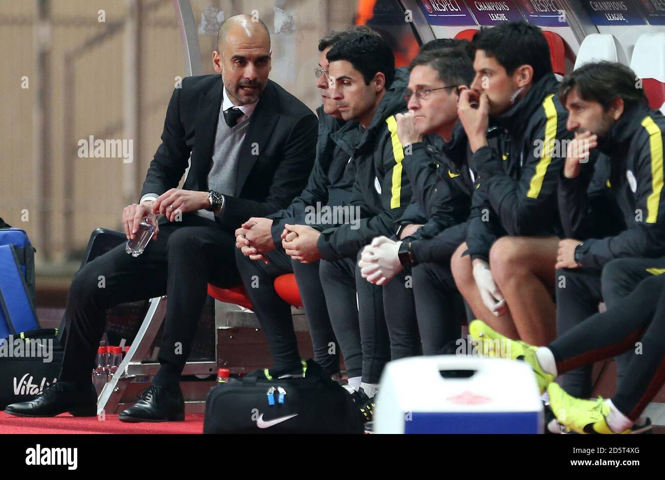 Manchester City manager Pep Guardiola (left) with coaching staff on the ...