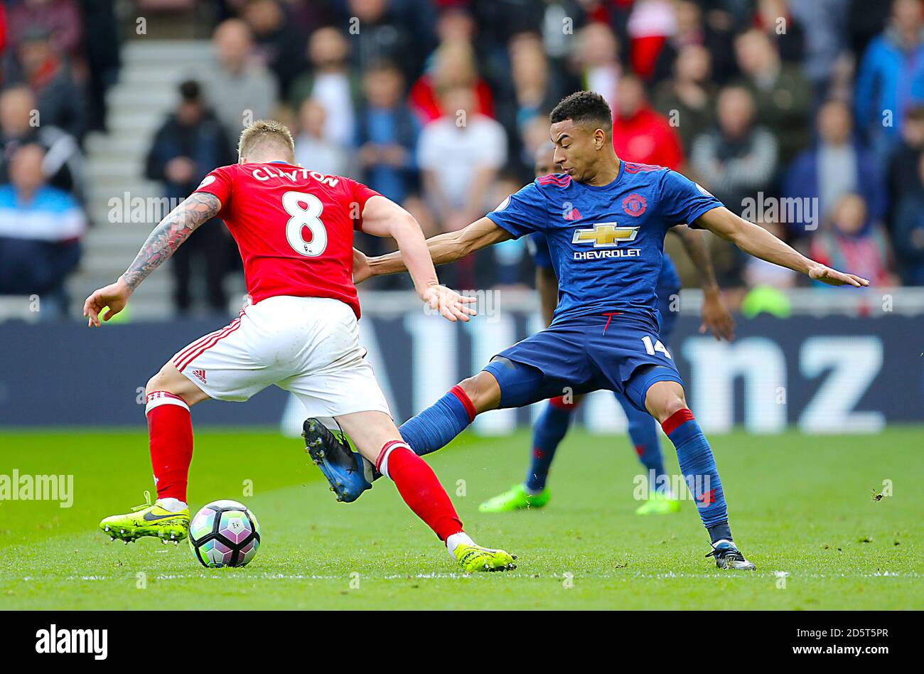 Middlesbrough's Adam Clayton (left) and Manchester United's Jesse ...