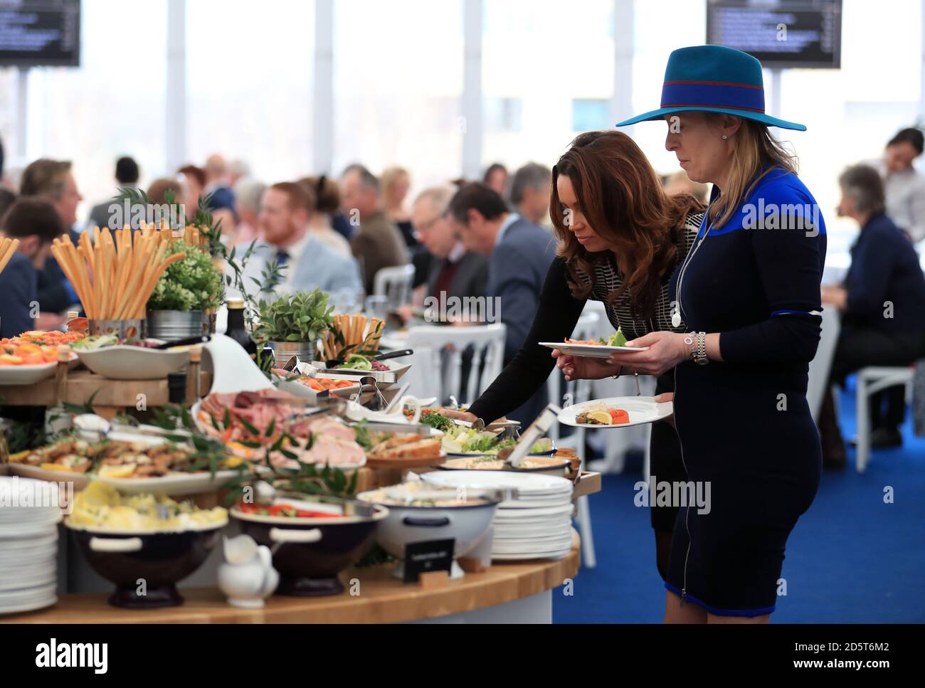 Guests help themselves to Food in Paddock View restaurant Stock Photo ...