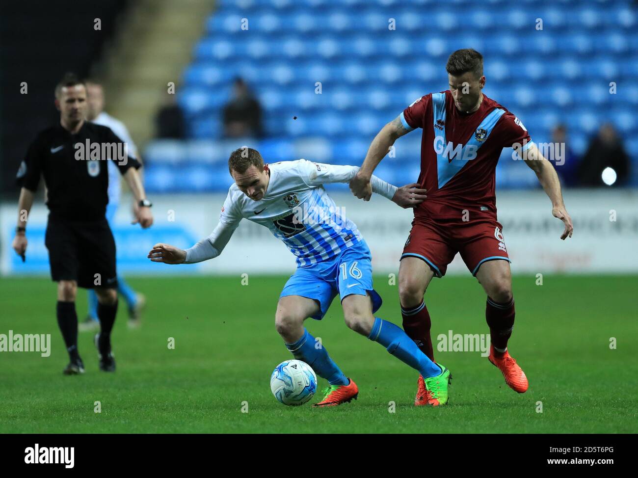 Coventry City's Stuart Beavon (left) and Port Vale's Ryan Taylor battle ...