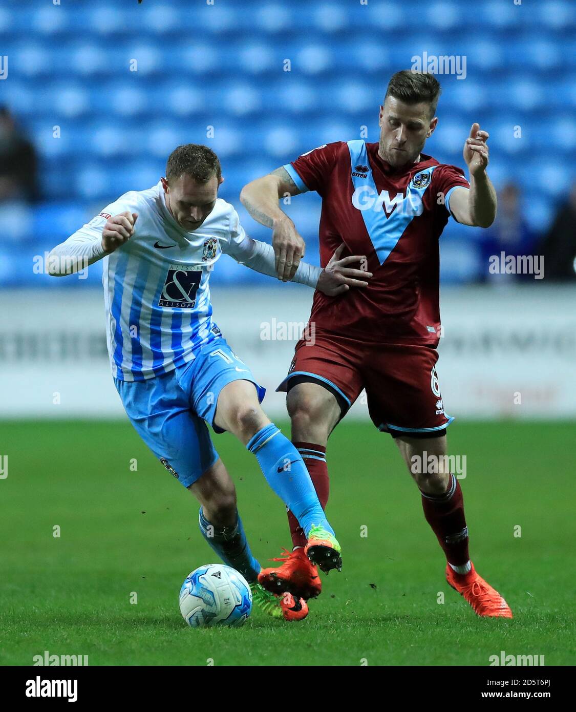 Coventry City's Stuart Beavon (left) and Port Vale's Ryan Taylor battle ...