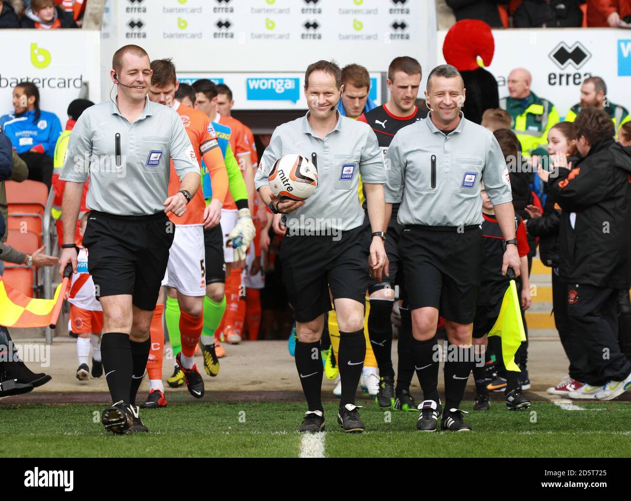 (l-r) Referees Darren Handley, Rob Lewis and Kevin Mattocks walk on to ...