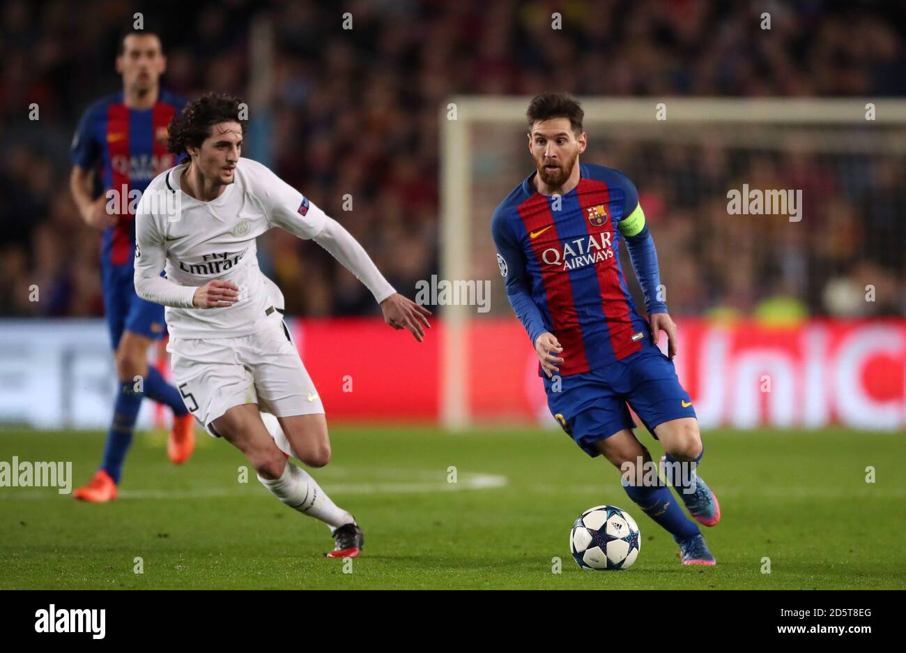 Paris Saint-Germain's Adrien Rabiot (left) and Barcelona's Lionel Messi ...