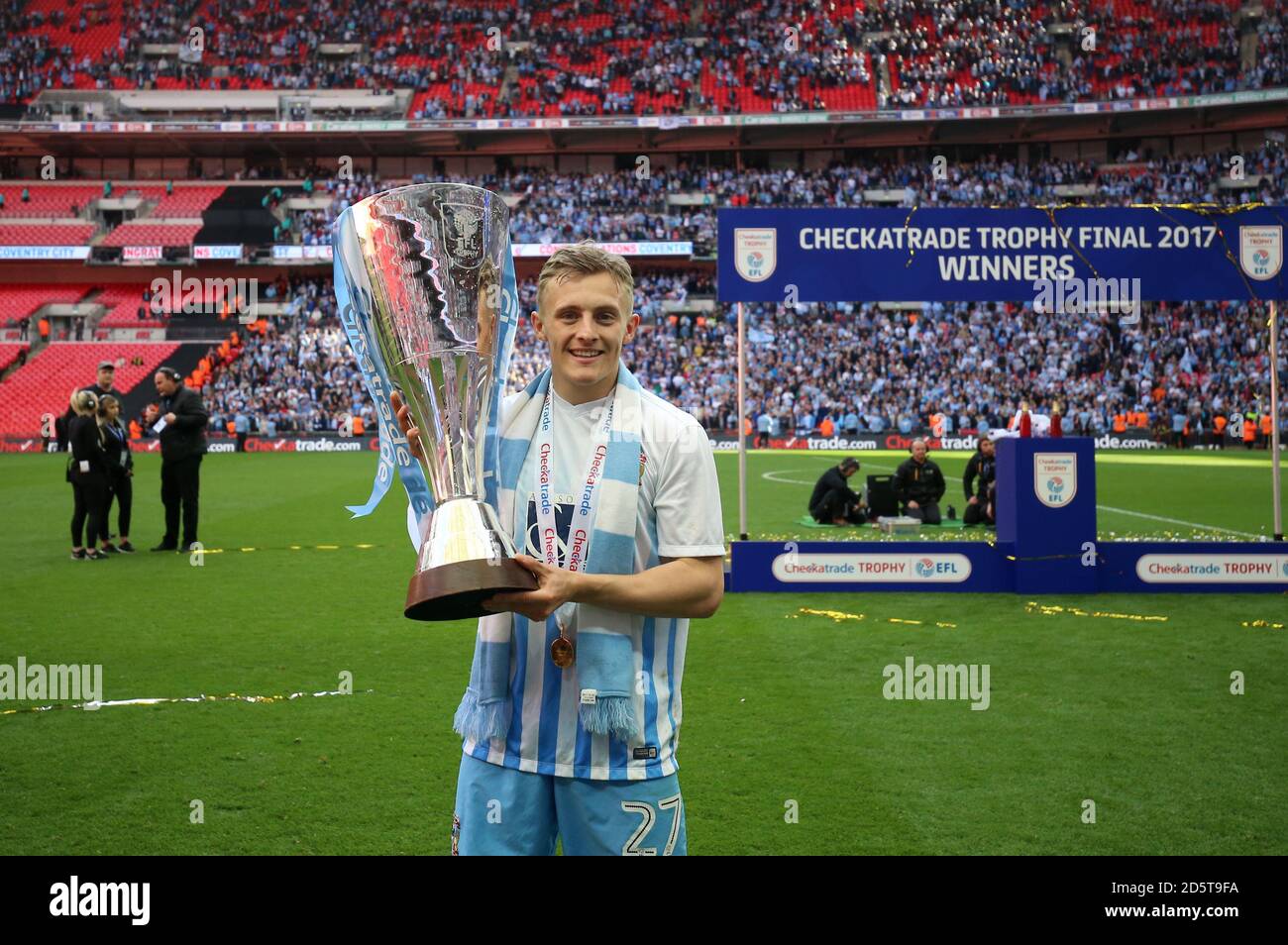 Coventry City's George Thomas celebrates on the pitch after winning the ...