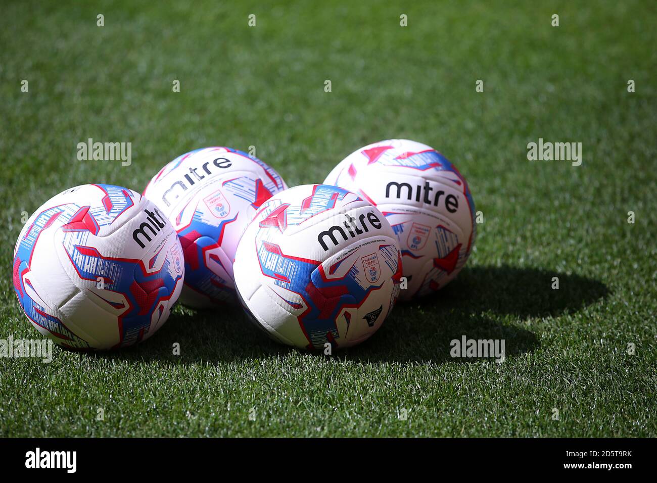 Mitre footballs on the pitch prior to the match Stock Photo - Alamy
