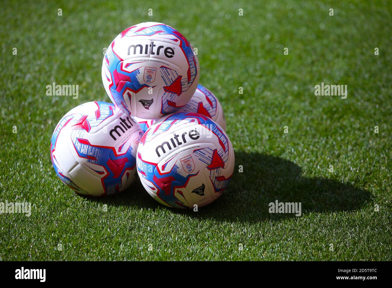 Mitre footballs on the pitch prior to the match Stock Photo - Alamy