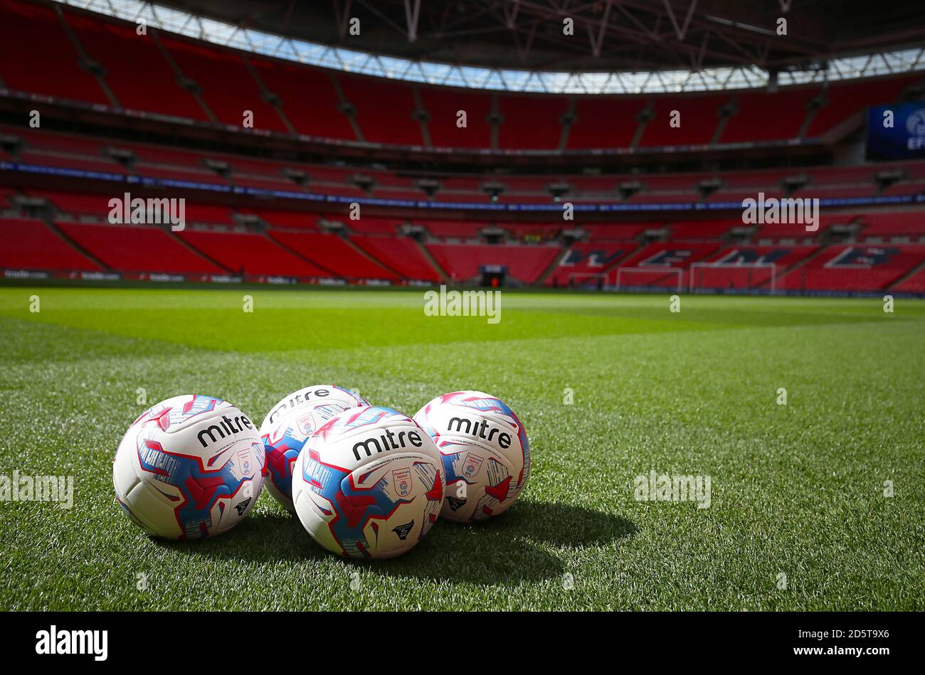 Mitre footballs on the pitch prior to the match Stock Photo - Alamy