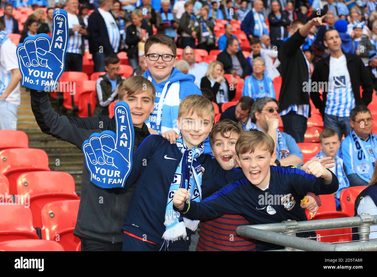Coventry City fans show their support in the stands Stock Photo - Alamy