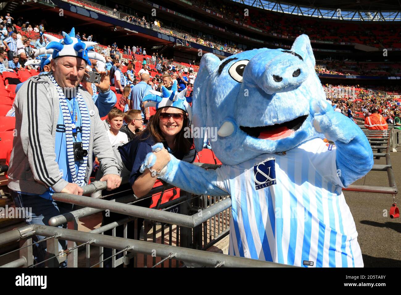 Coventry City club mascot Sky Blue Sam with supporters Stock Photo - Alamy