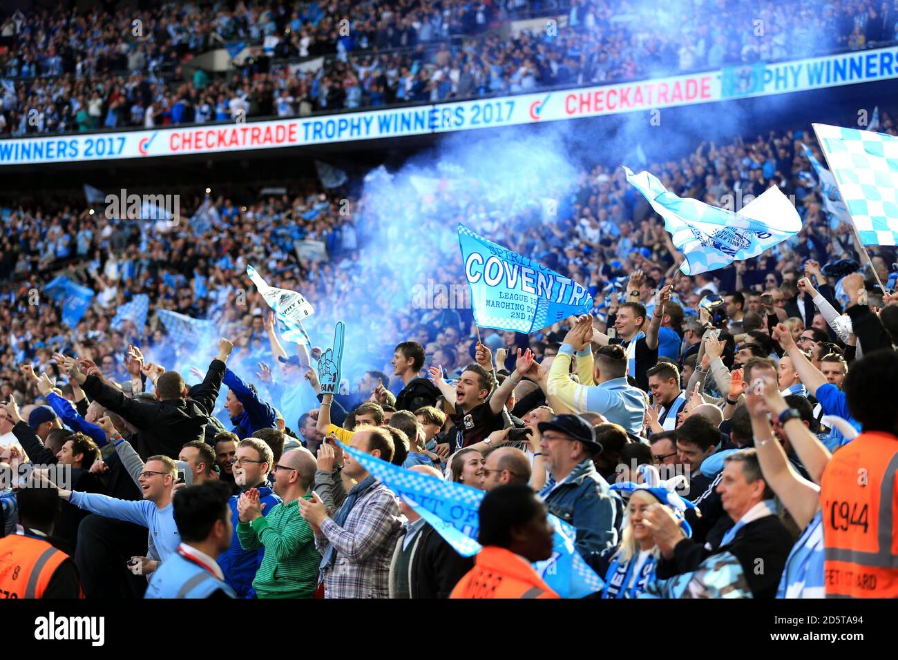 Coventry City fans celebrate in the stands Stock Photo - Alamy