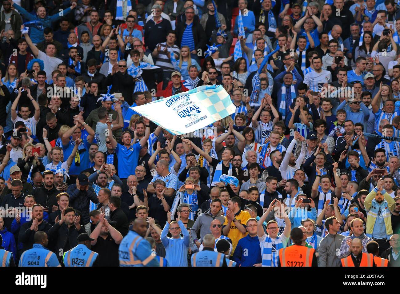 Coventry City fans in the stands show their support Stock Photo - Alamy