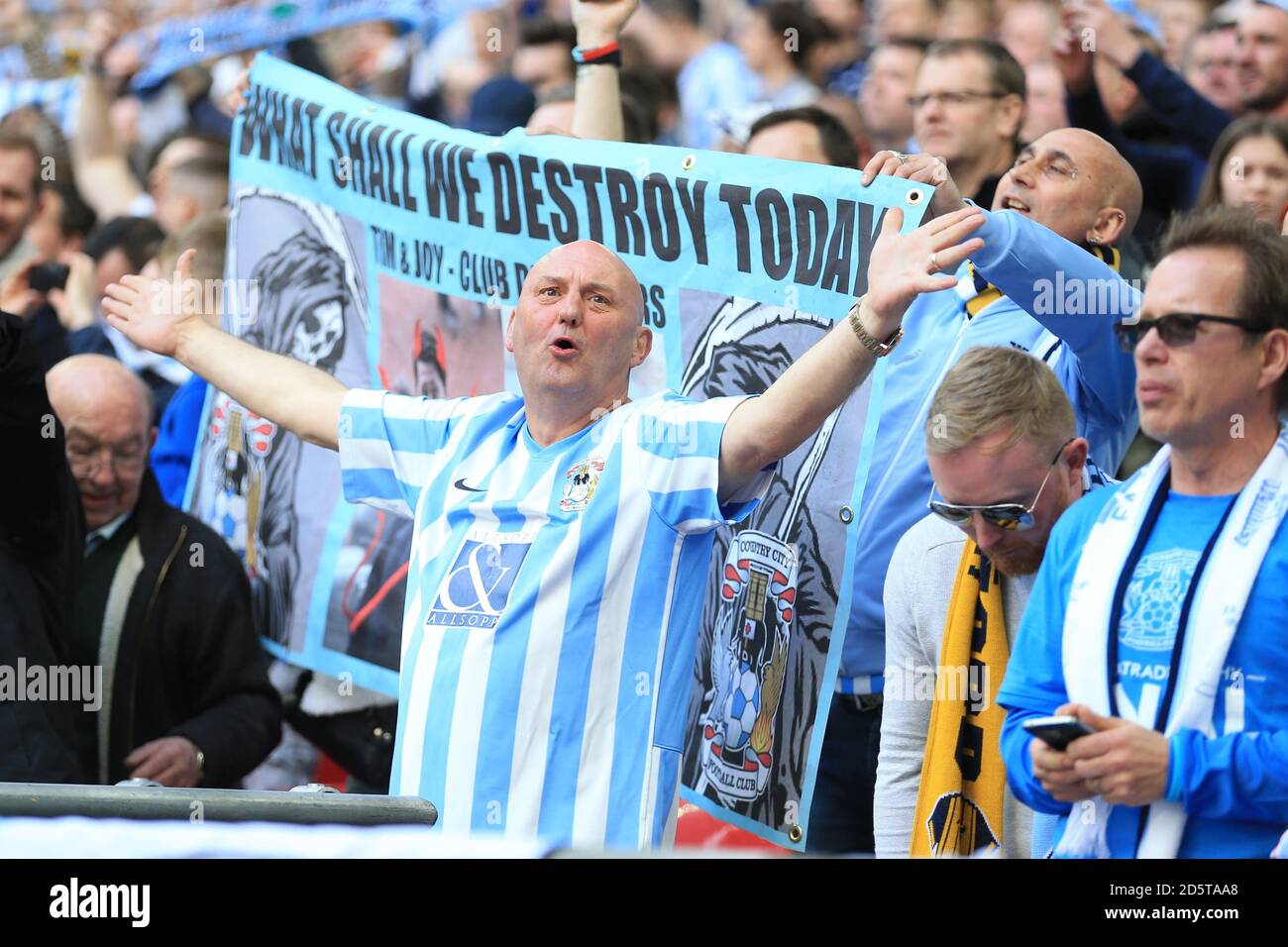 Coventry City fans celebrate in the stands Stock Photo - Alamy