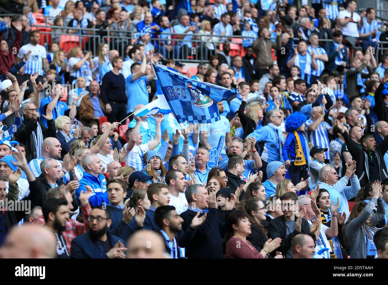 Coventry City fans celebrate in the stands Stock Photo - Alamy