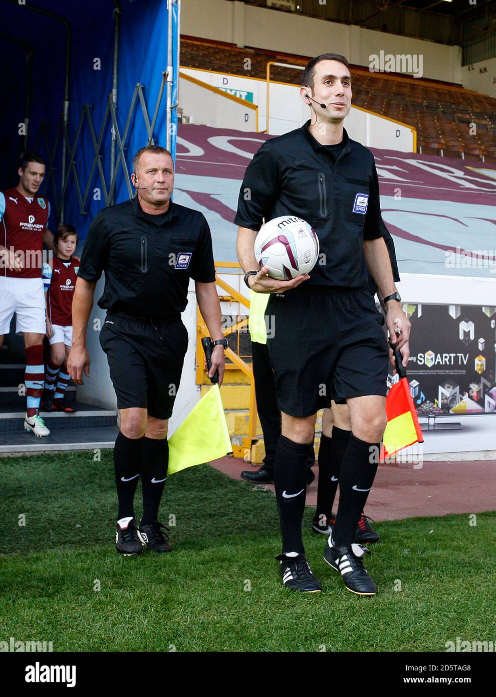 Assistant referee Paul Kettlewell (left) and referee David Coote Stock ...