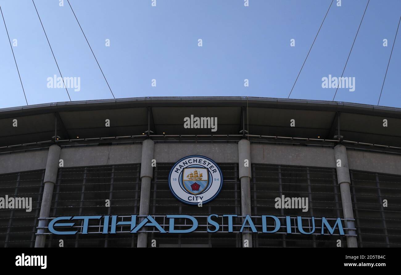 Blue skies over the Etihad Stadium Stock Photo - Alamy