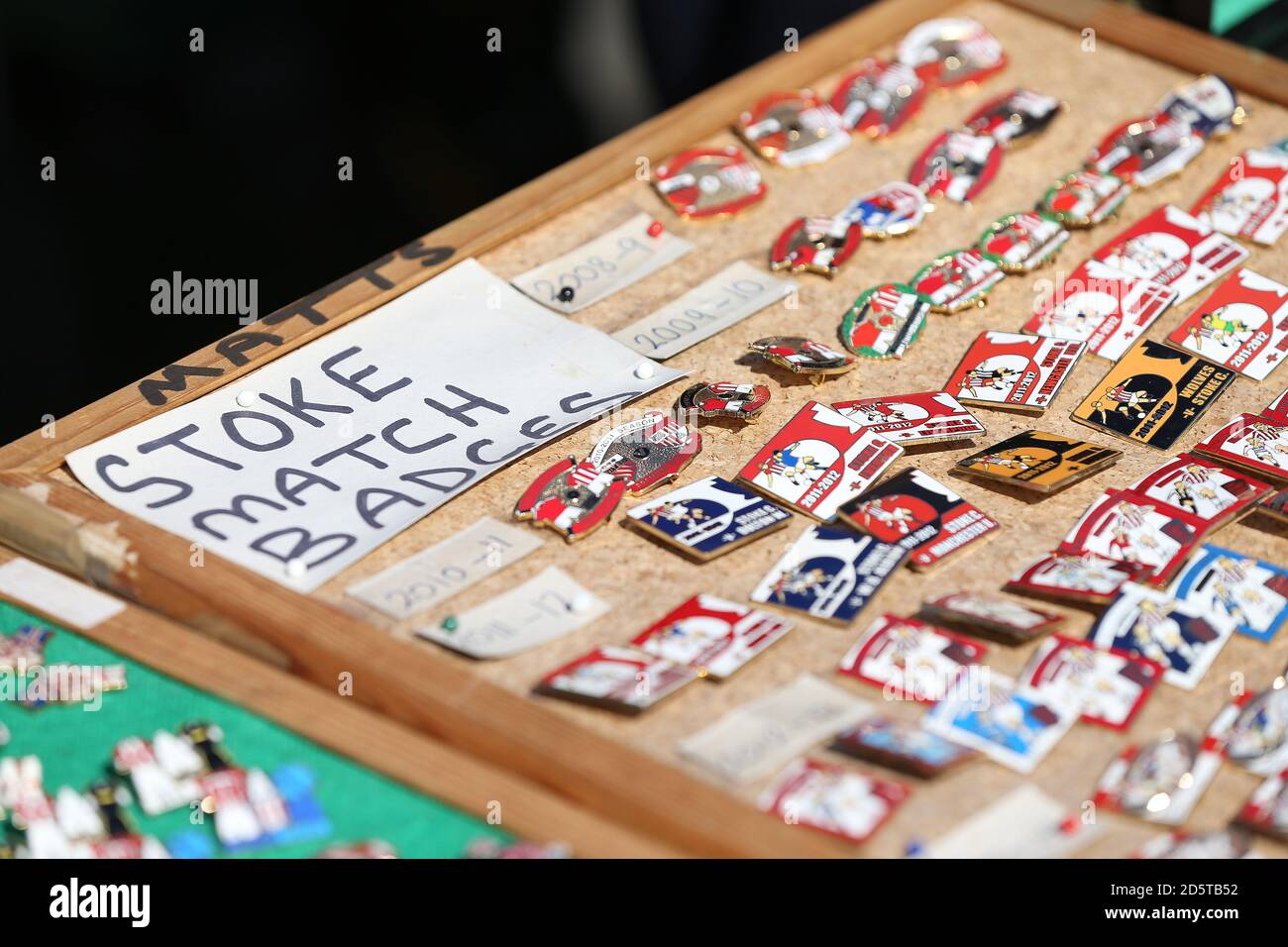 Stoke badges on sale before Stoke City's and Liverpool's match at the ...