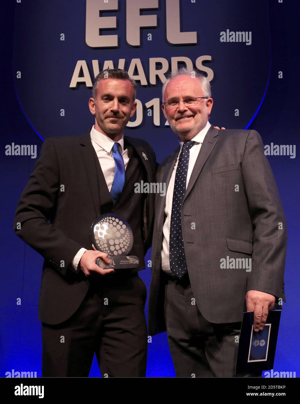 Brentford's Kevin O'Connor (left) is presented with The Sir Tom Finney ...
