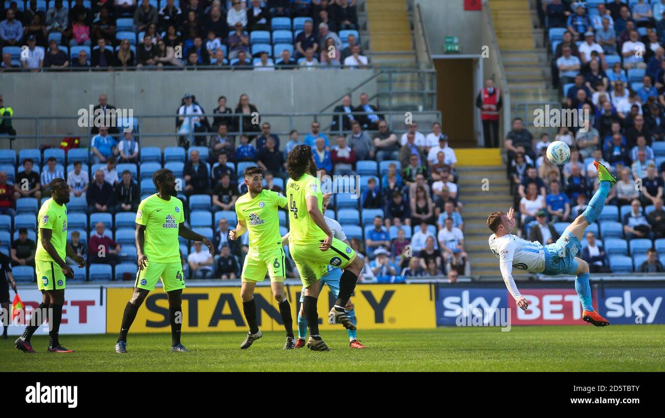 Coventry City's Stuart Beavon (right) attempts an overhead kick Stock ...