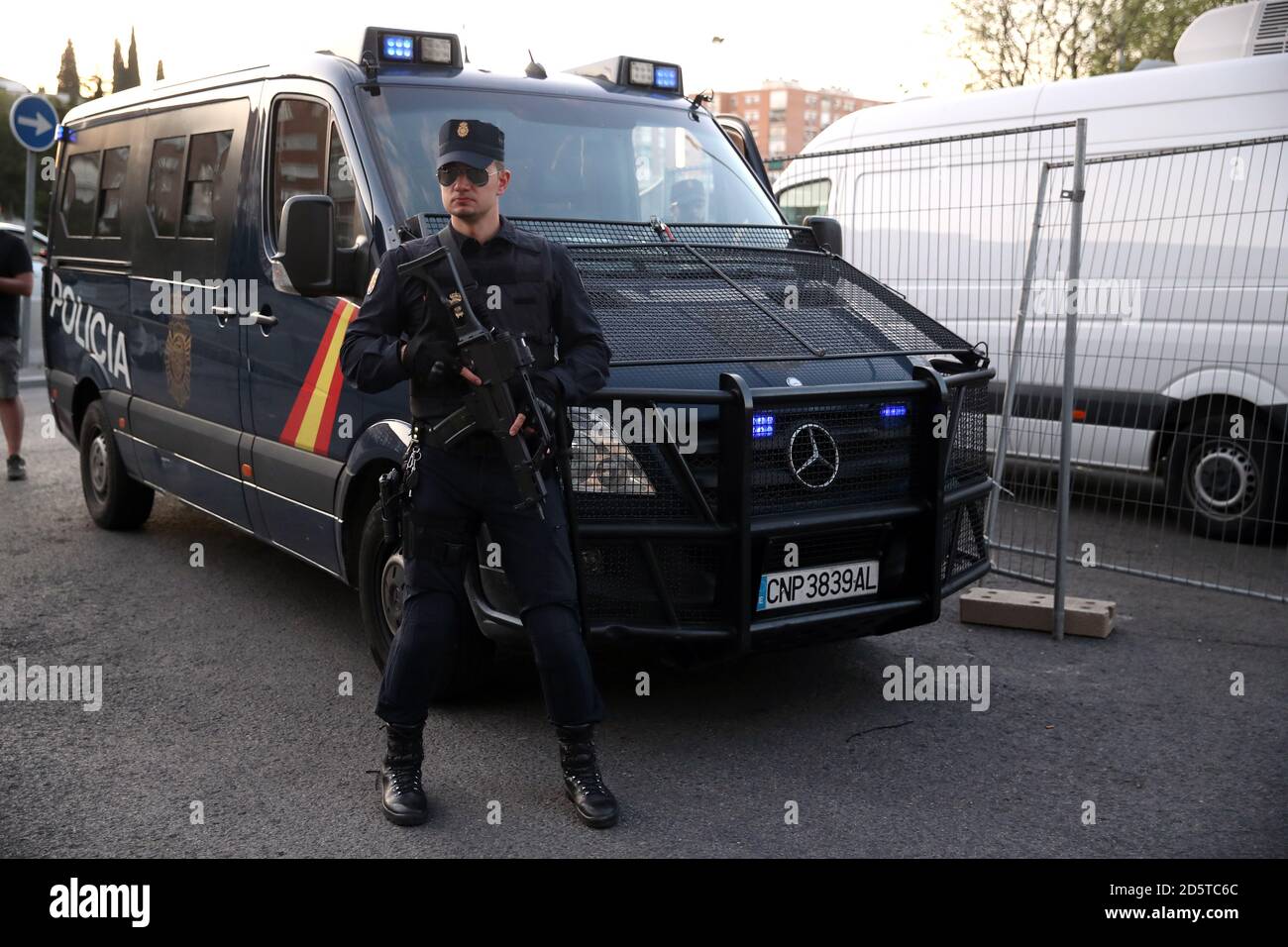 Armed police outside the ground for the team coaches Stock Photo - Alamy
