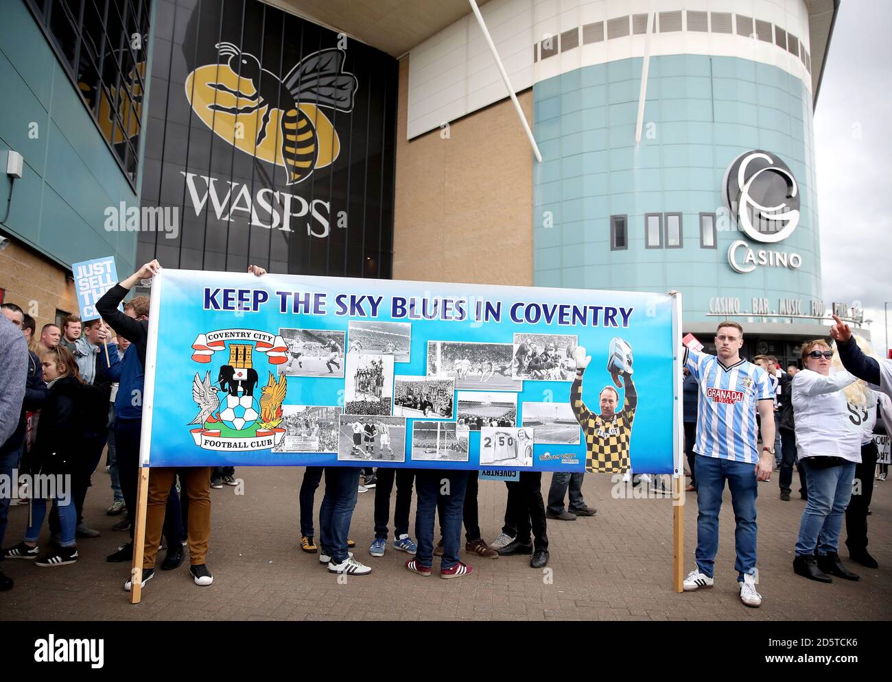 Coventry City fans with a 'Keep The Sky Blues in Coventry' banner Stock ...