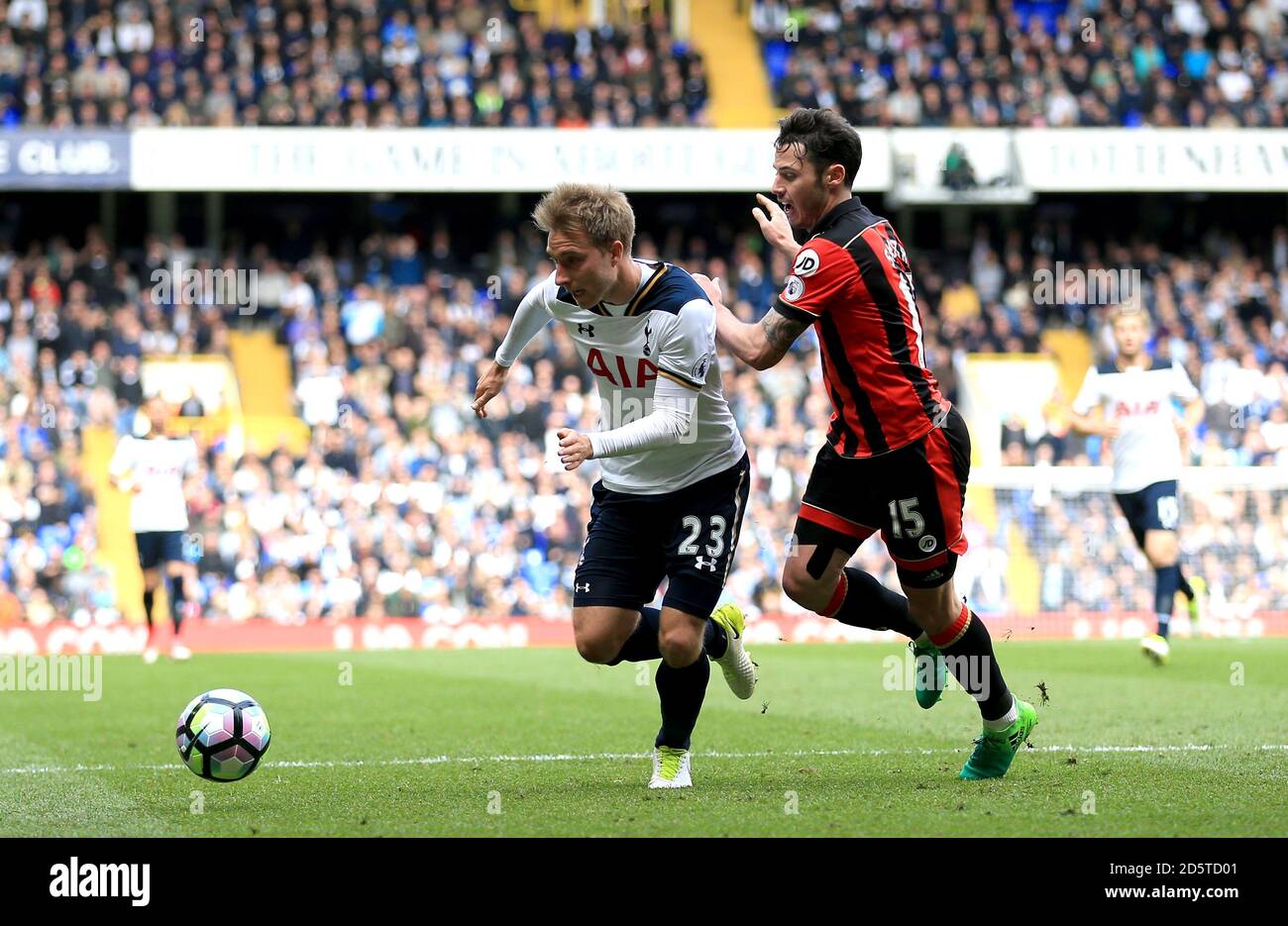 Tottenham Hotspur's Christian Eriksen (left) and AFC Bournemouth's Adam ...