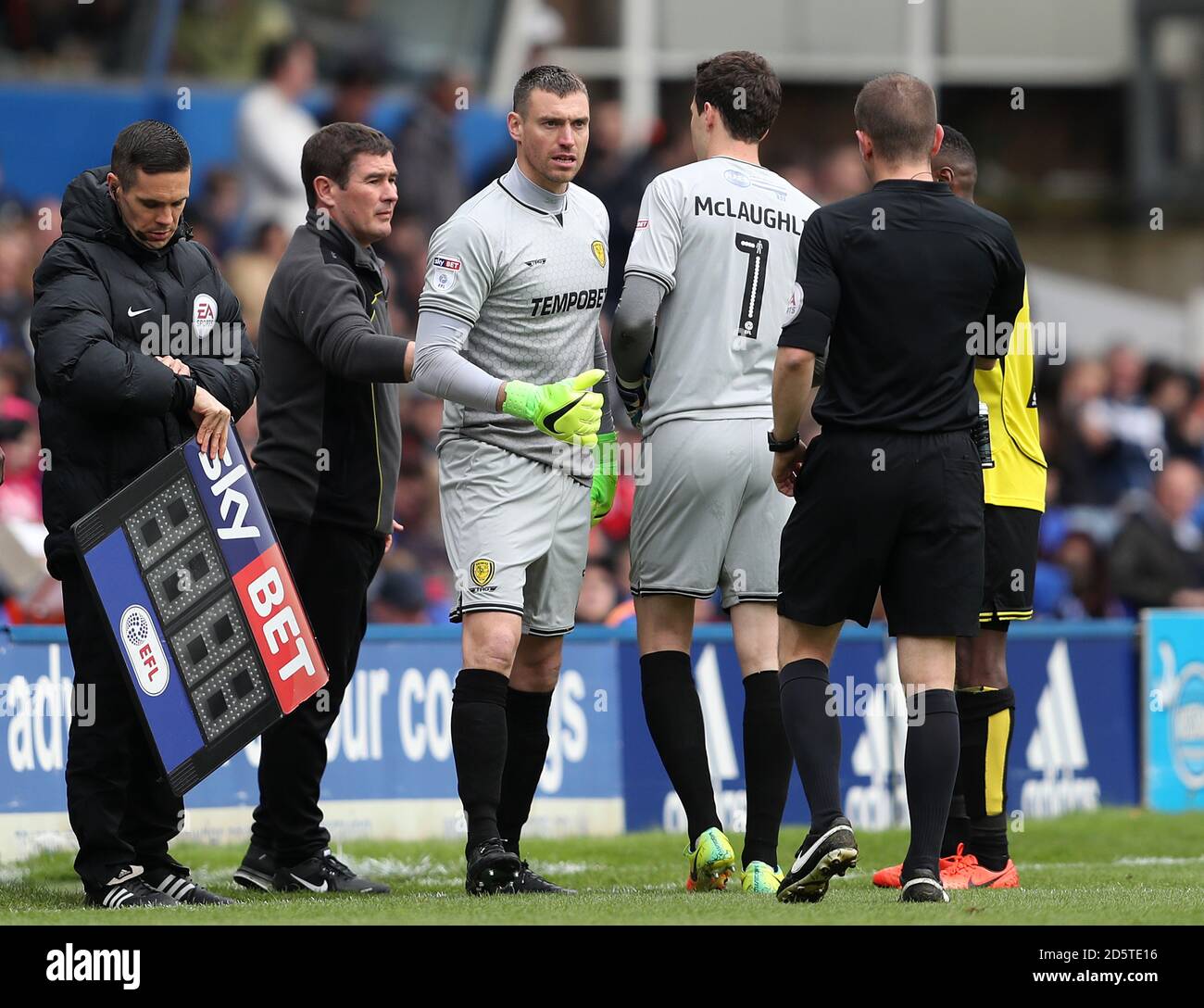 Burton Albion goalkeeper Jon McLaughlin (right) is replaced by ...