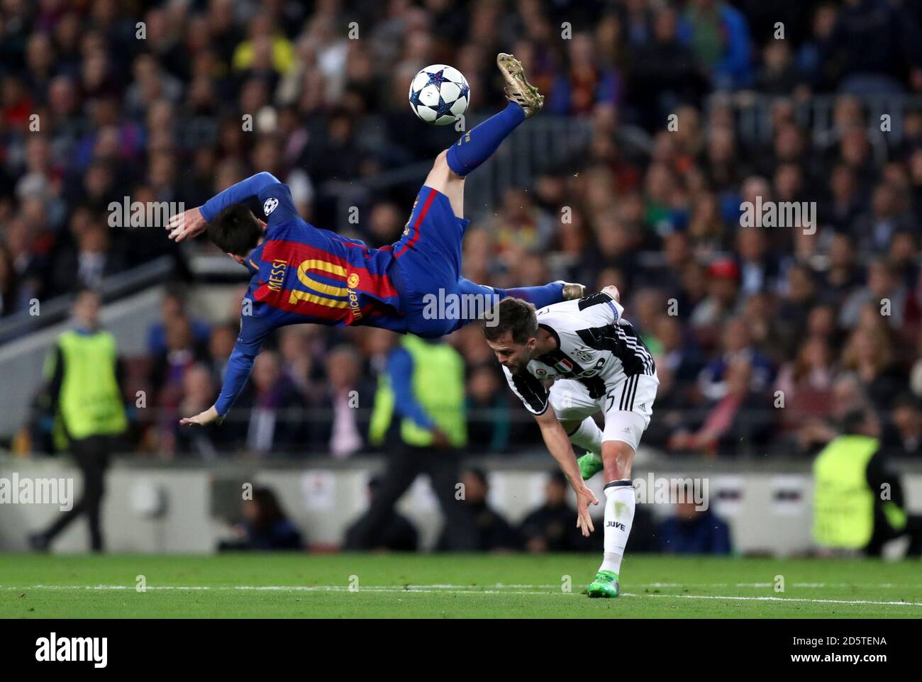 Barcelona's Lionel Messi (left) is fouled by Juventus' Miralem Pjanic ...
