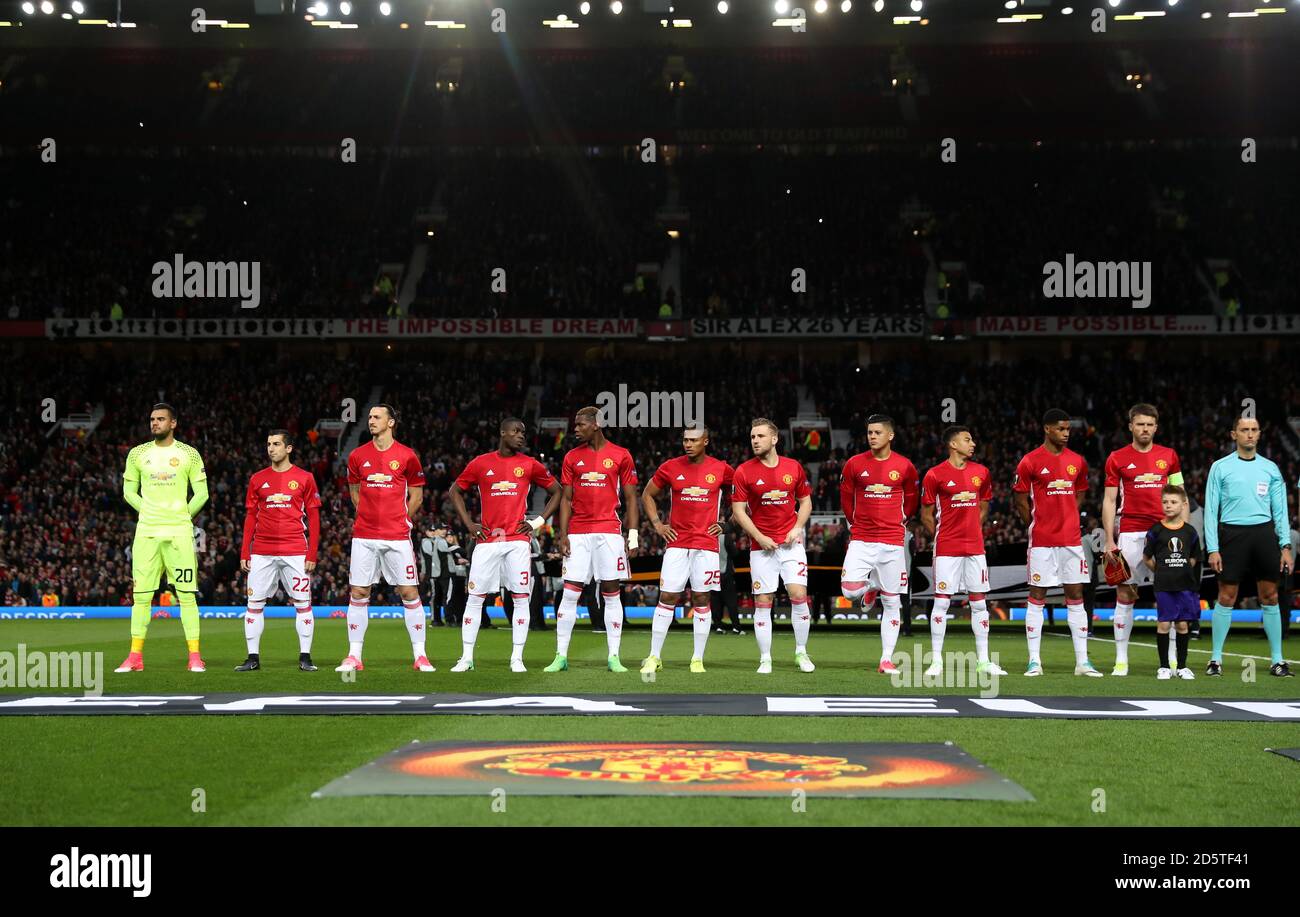 Manchester United players line up before kick off Stock Photo - Alamy