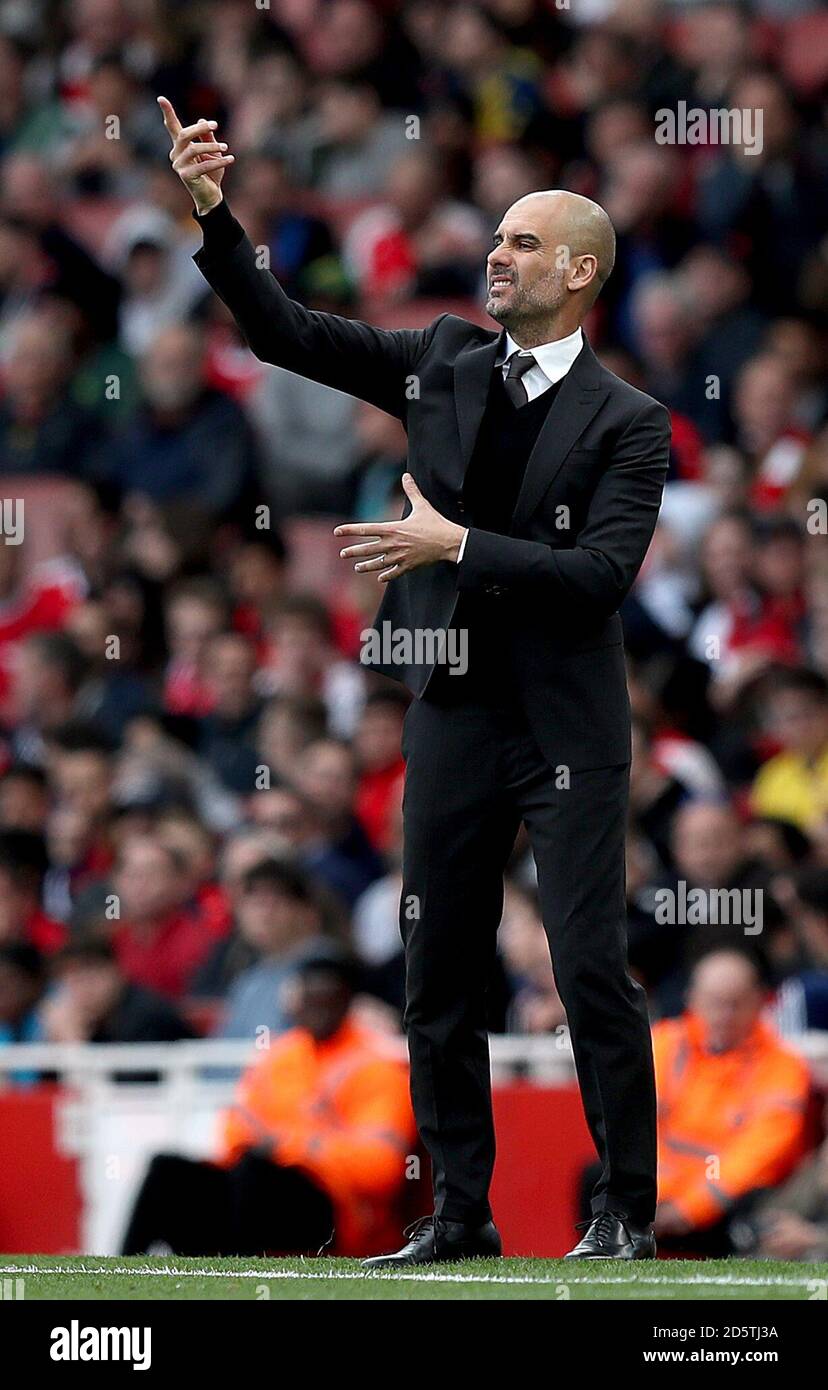 Manchester City manager Pep Guardiola gestures on the touchline Stock ...