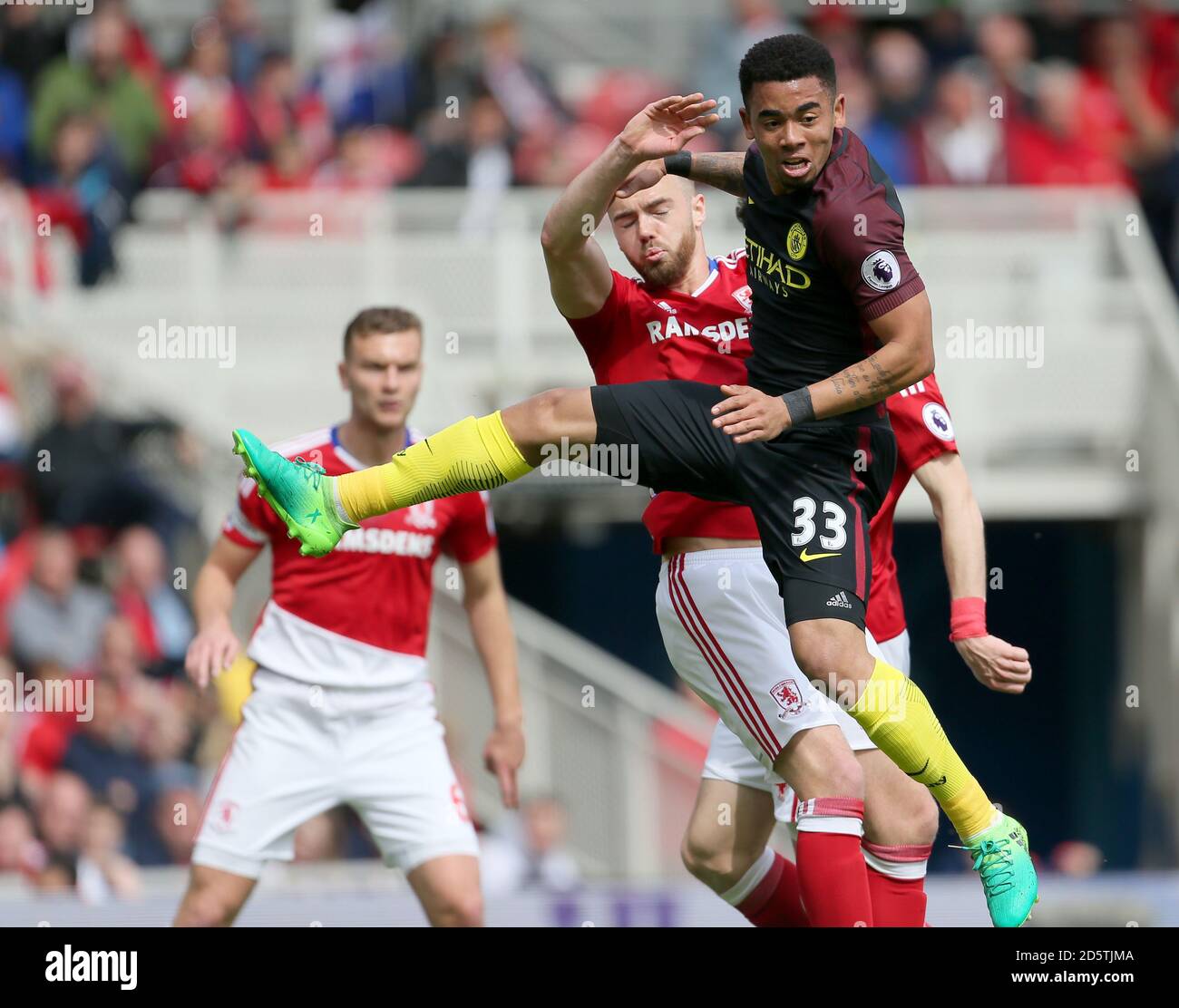 Manchester City's Gabriel Jesus jumps for possession Stock Photo - Alamy