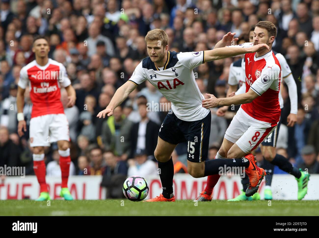 Tottenham Hotspur's Eric Dier and Arsenal's Aaron Ramsey battle for the ...