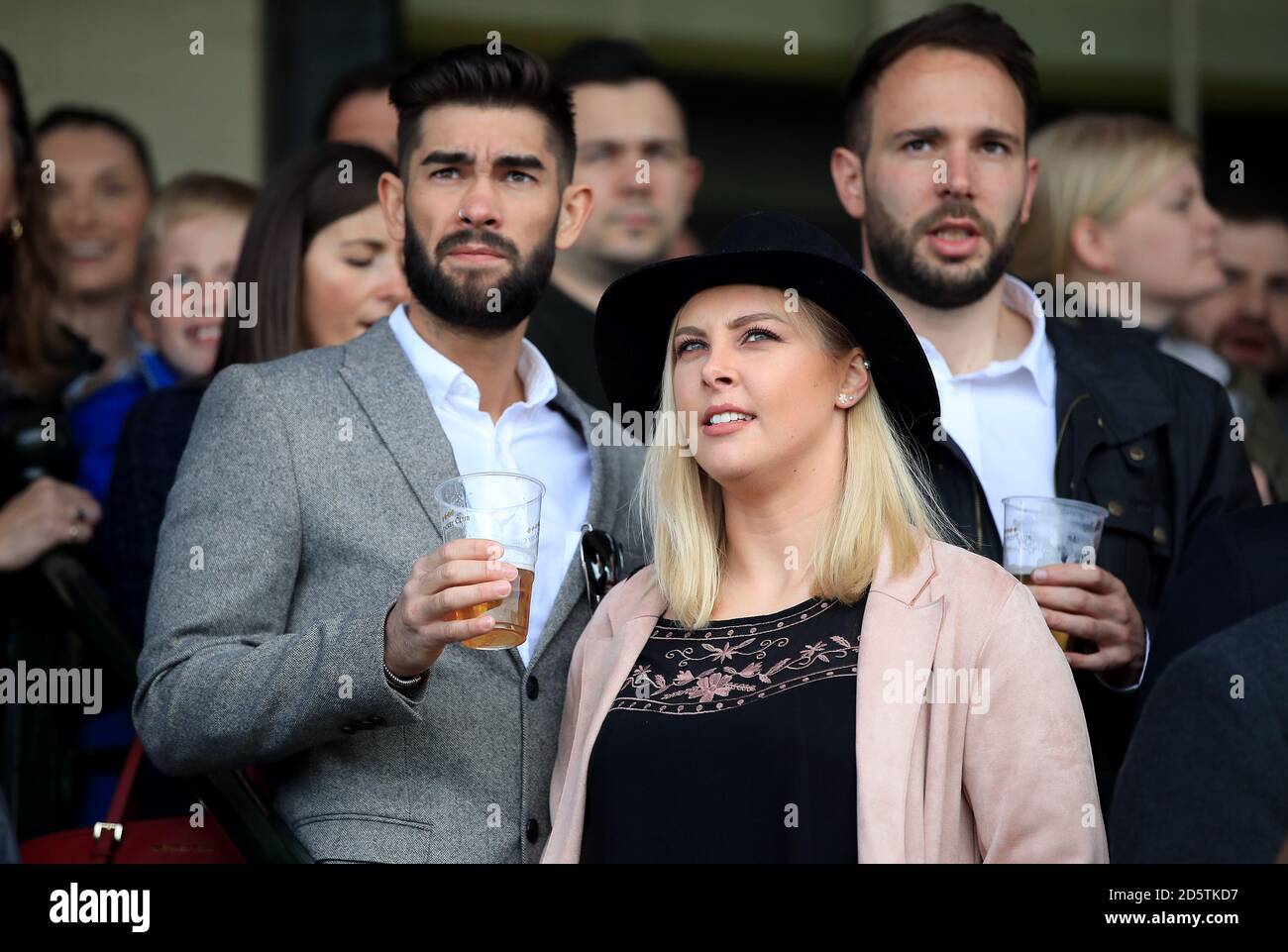 Racegoer watches the action during the Kids Carnival Day at Warwick ...