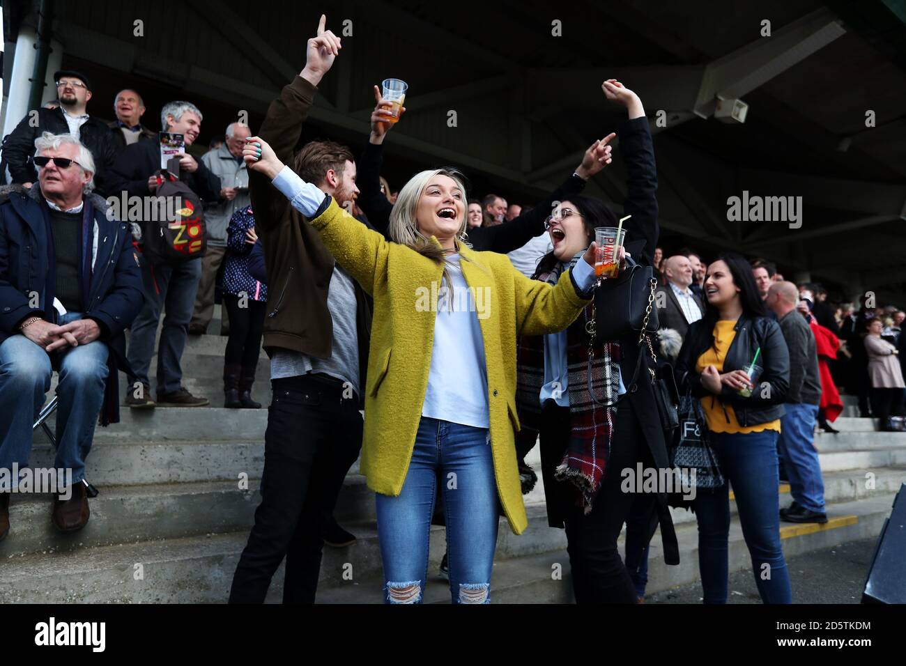 Racegoers react in the crowd during Kids Carnival Day at Warwick ...