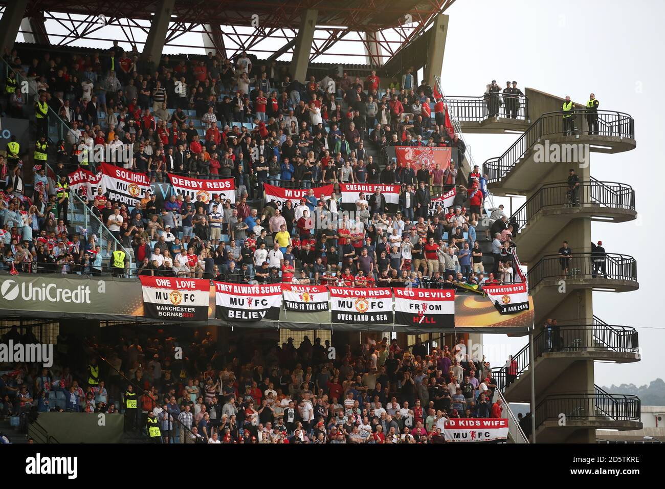 Manchester United fans in the stands Stock Photo - Alamy
