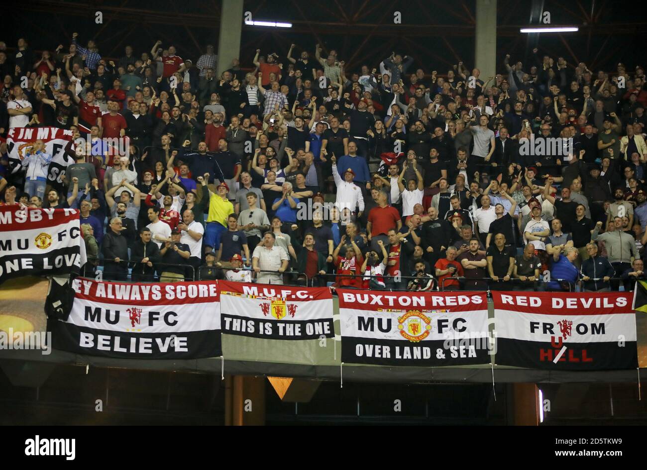 Manchester United fans in the stands Stock Photo - Alamy